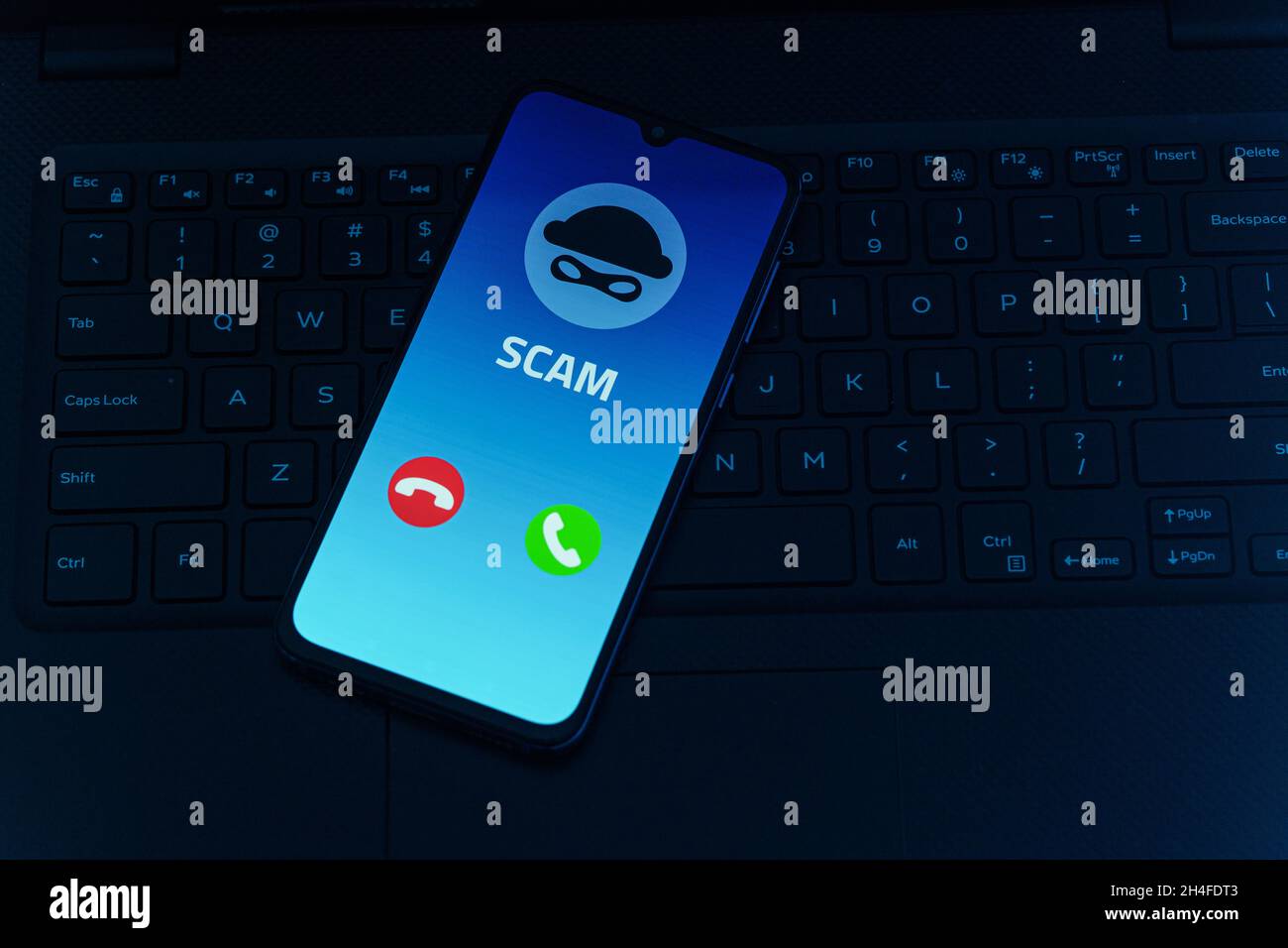 Incoming call from scammer. Scam call on phone Stock Photo - Alamy