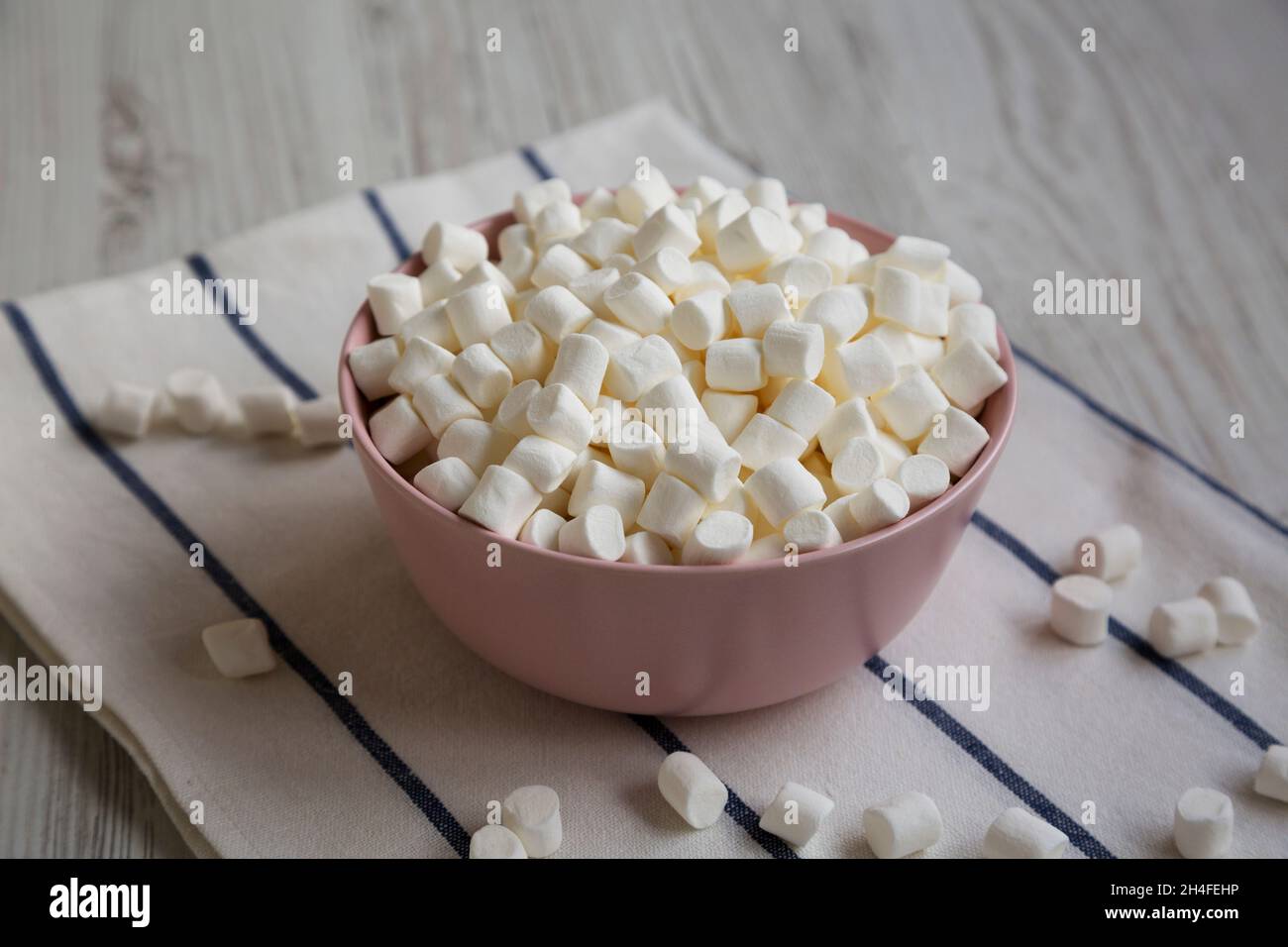 White Mini Marshmallows in a Pink Bowl, low angle view Stock Photo - Alamy