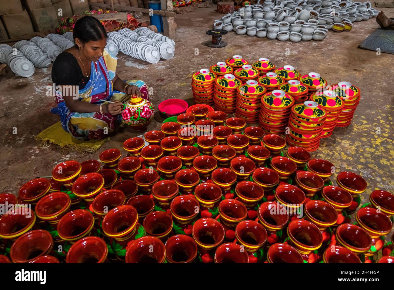 Kolkata, India. 02nd Nov, 2021. Potter is busy making Diya (lamp ...