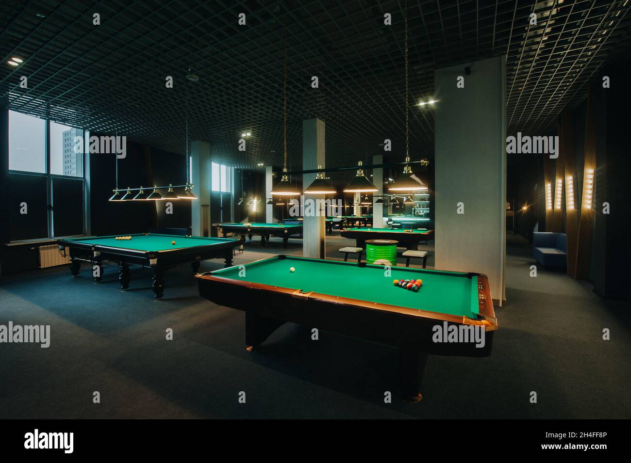 Billiard table with green surface and balls in the billiard club.Pool ...