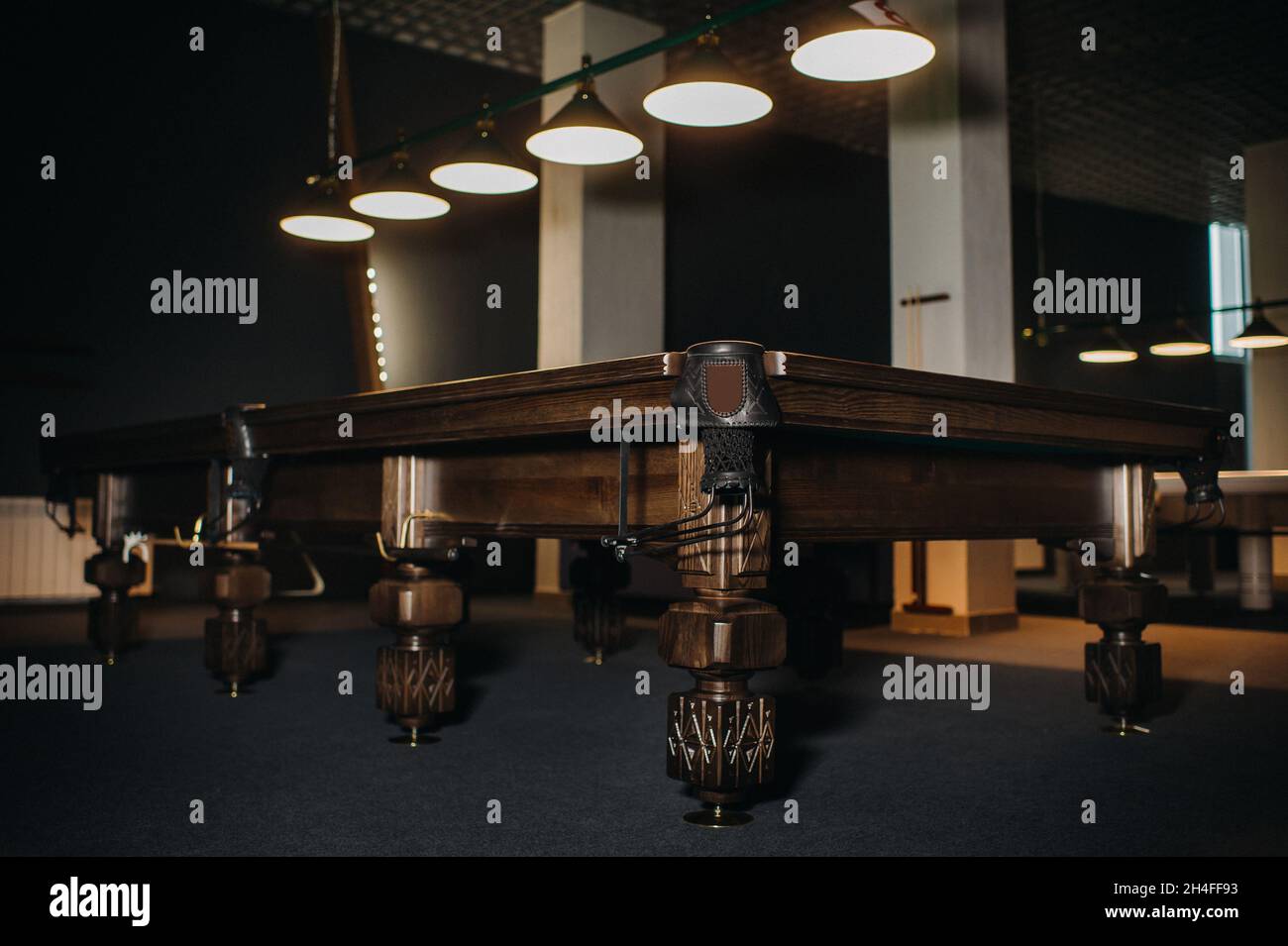 Oak unusual Billiard table in a billiard club.Bottom view Stock Photo ...