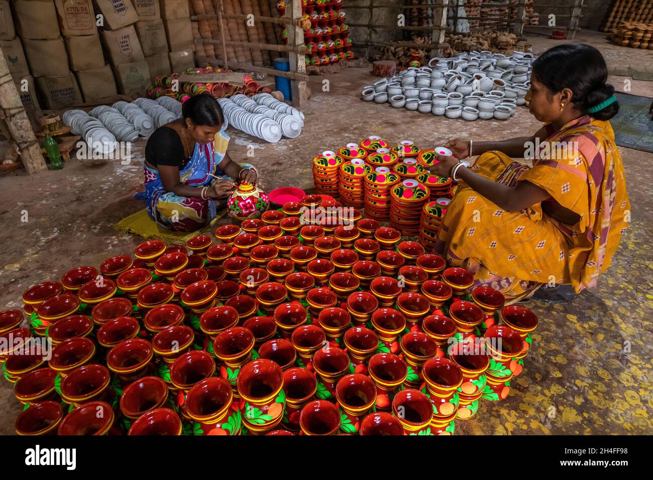 Kolkata, India. 02nd Nov, 2021. Potter is busy making Diya (lamp ...
