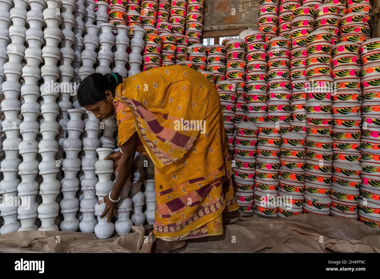 Kolkata, India. 02nd Nov, 2021. Potter is busy making Diya (lamp ...
