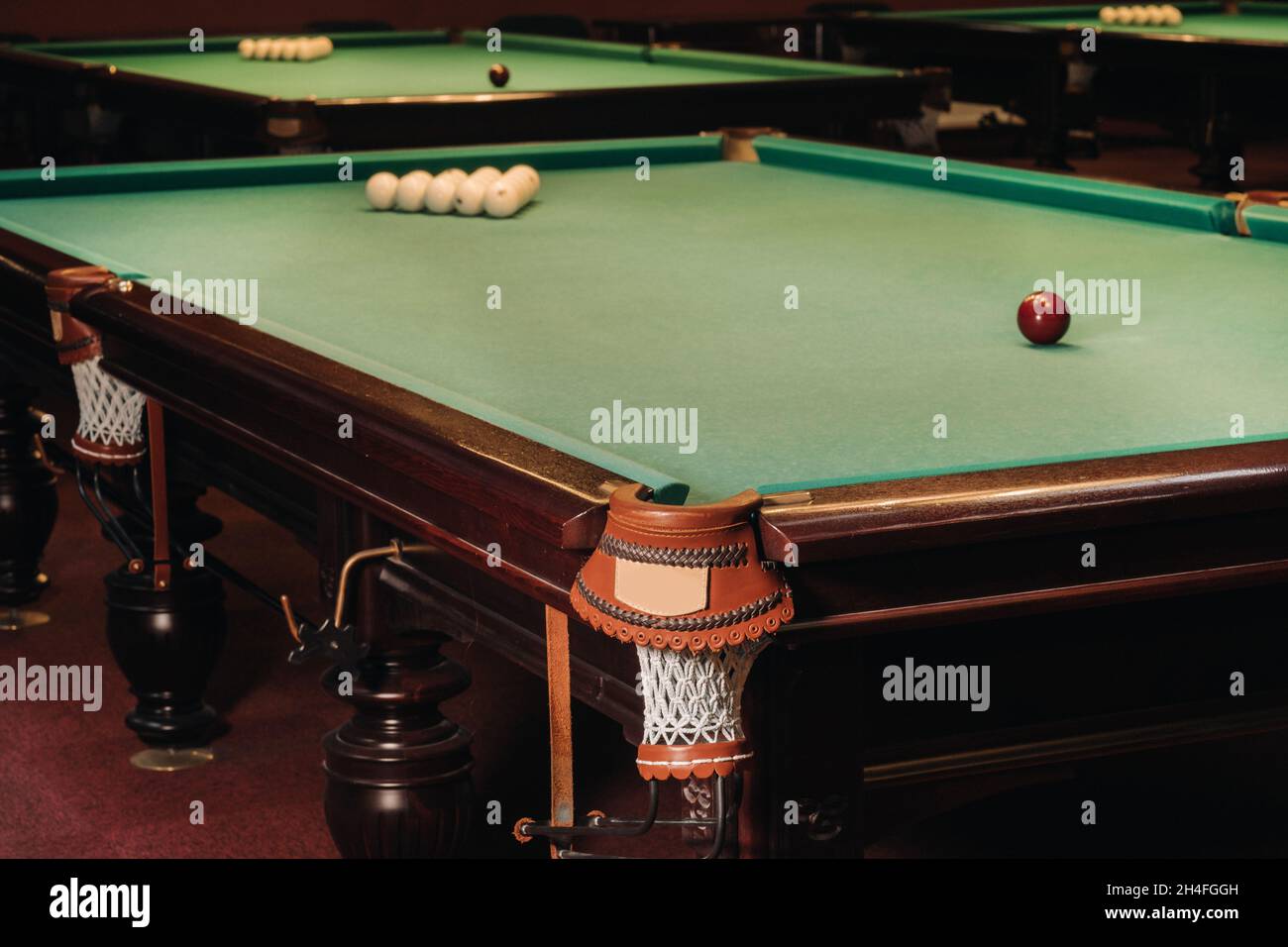 Billiard table with green surface and balls in the billiard club.Pool ...