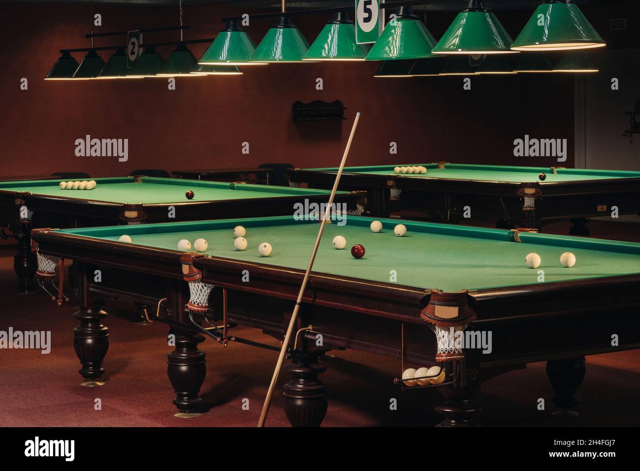 Billiard table with green surface and balls in the billiard club.Pool ...