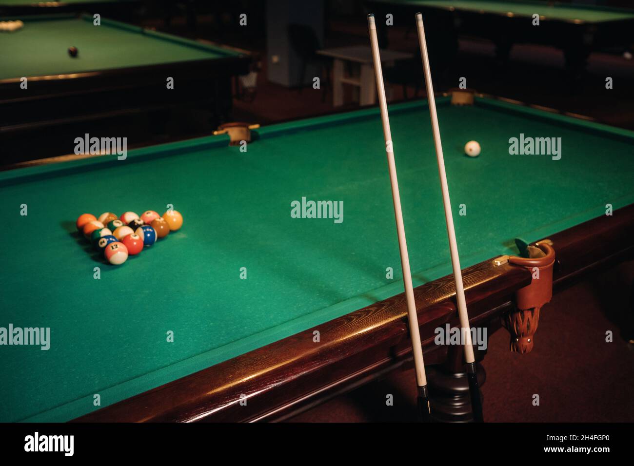 Billiard table with green surface and balls in the billiard club.Pool ...