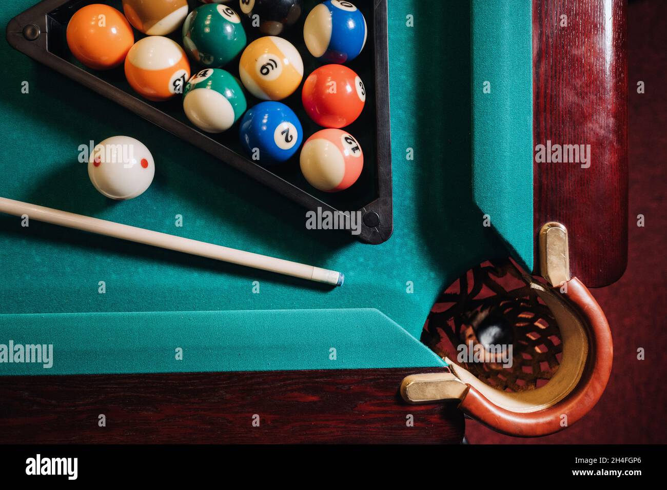 Billiard table with green surface and balls in the billiard club.Pool ...