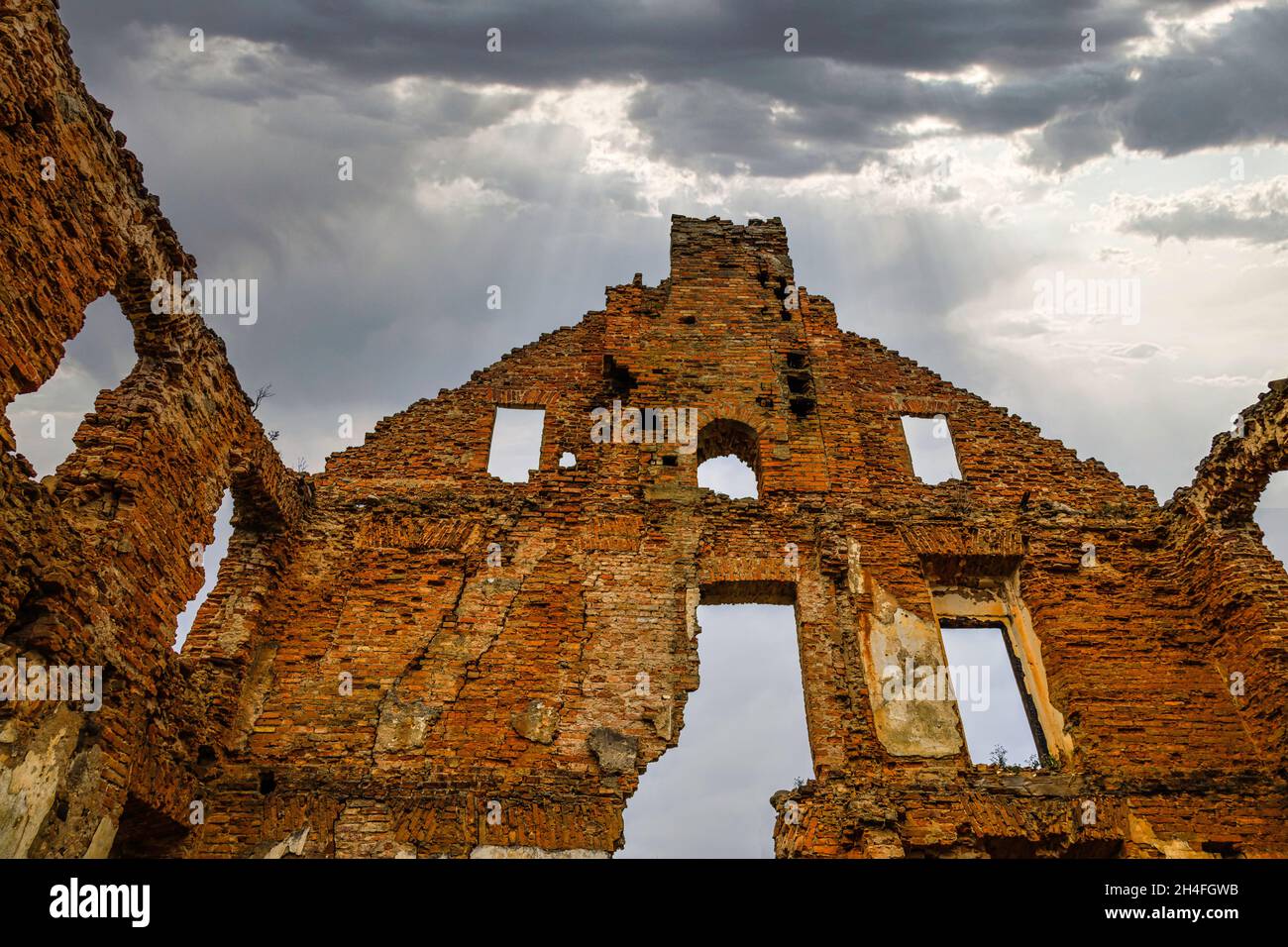 old manor bricks ruin with dramatic sky. Republic of Paulava, Lithuania ...