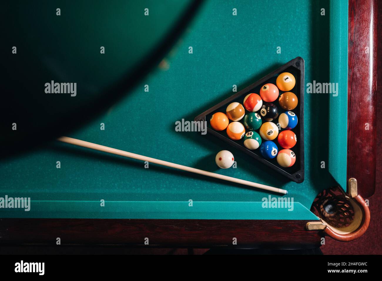 Billiard table with green surface and balls in the billiard club.Pool ...