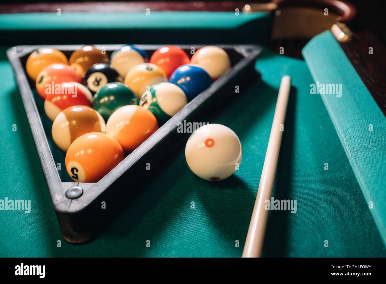 Billiard table with green surface and balls in the billiard club.Pool ...