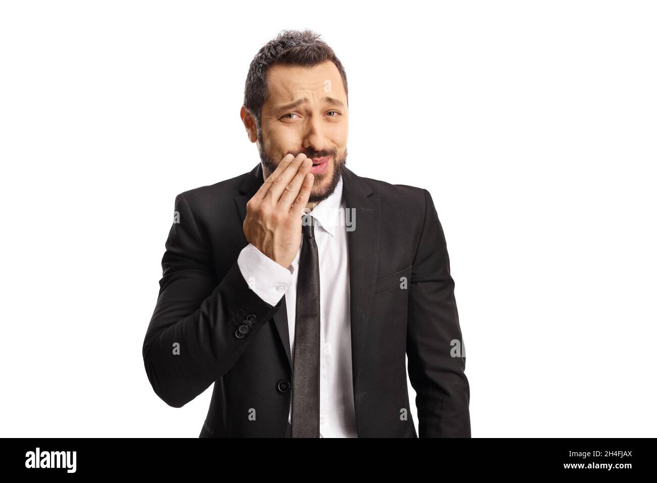 Man in a suit and tie making fun of something and laughing isolated on ...