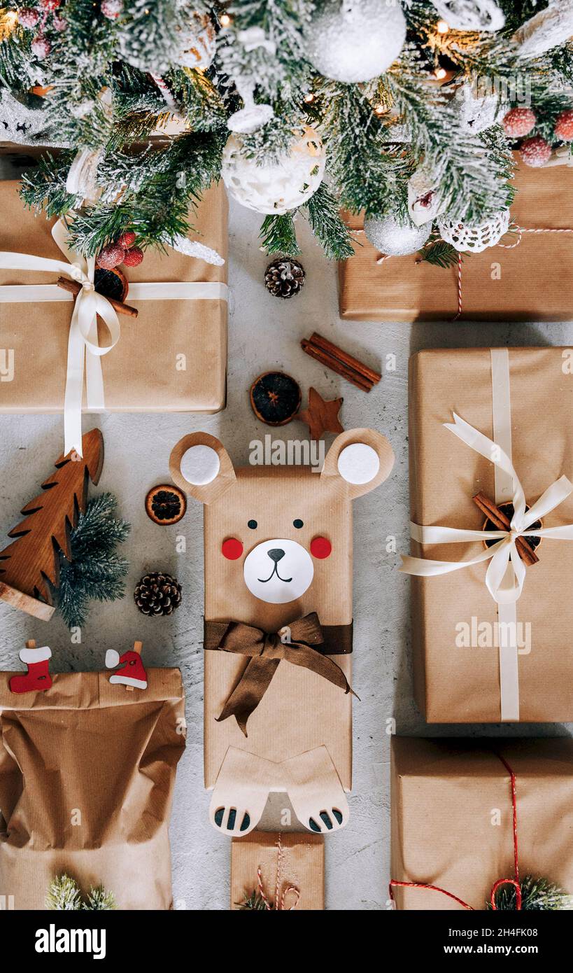 Overhead image of wrapped presents under decorated Christmas tree Stock ...