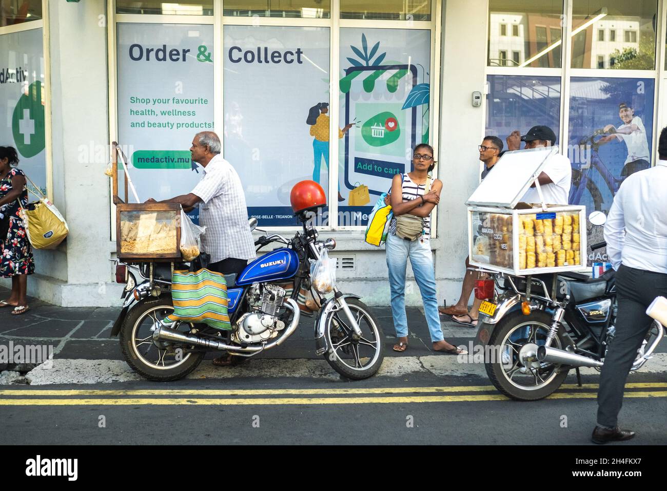 DECEMBER 3, 2019.MAURITIUS.Port Louis. a city street with people in the ...