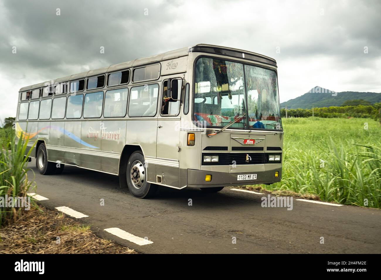 December 6, 2019.MAURITIUS: A shuttle bus travels along a local road ...