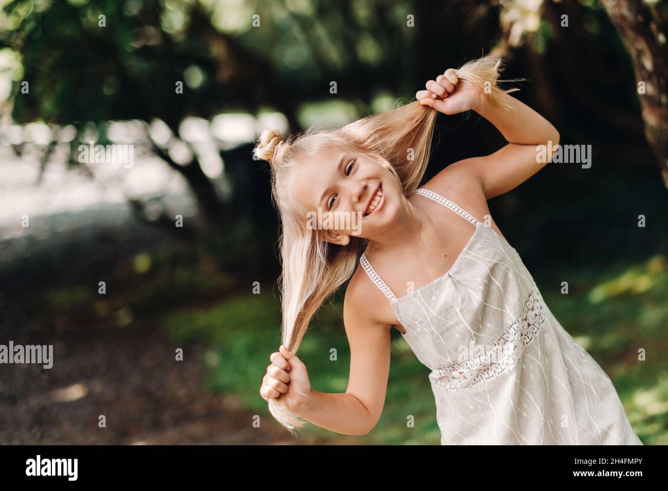 Summer portrait of a happy little girl on the island of Mauritius ...