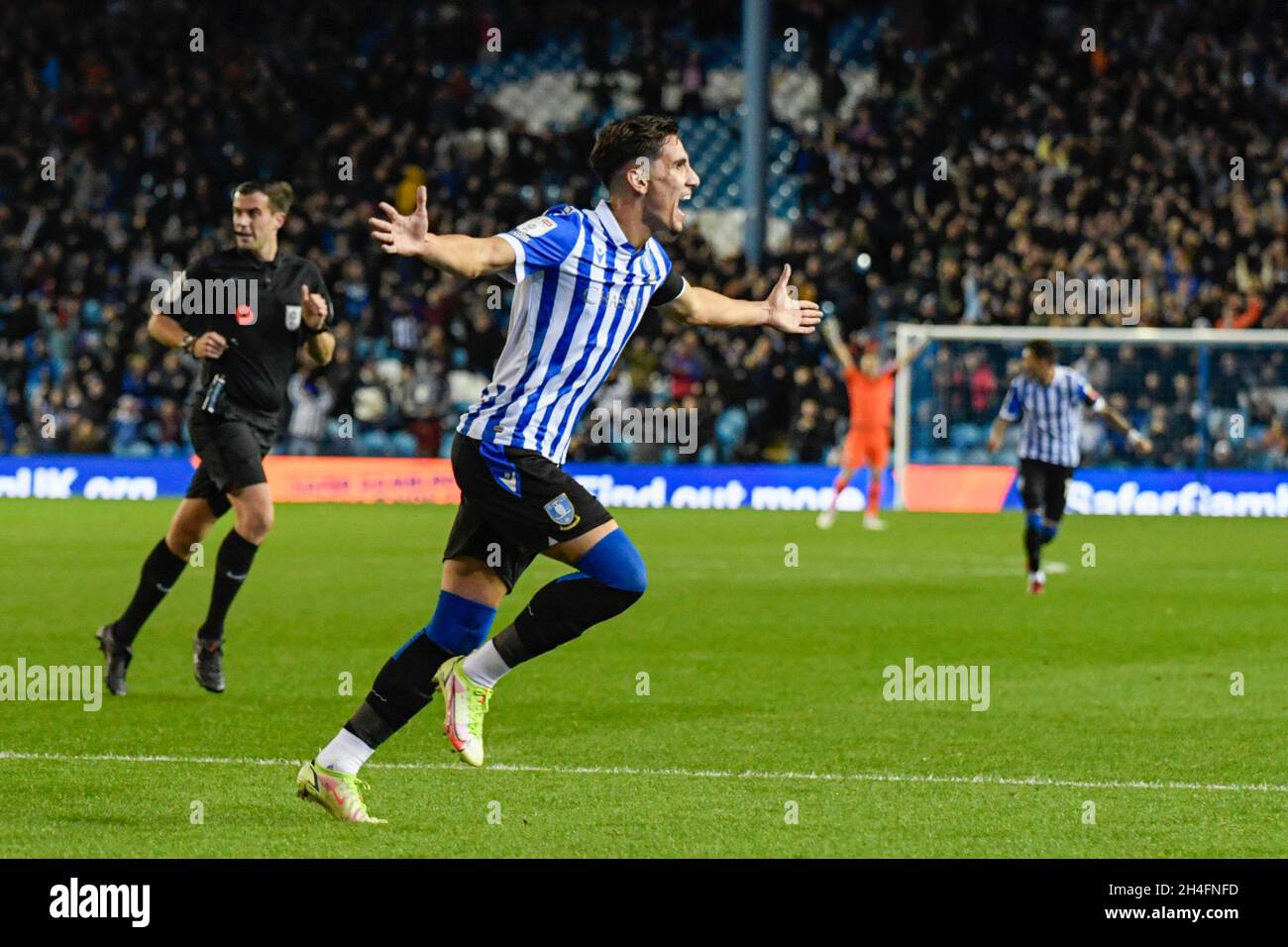 Theo Corbeanu #23 of Sheffield Wednesday celebrates scoring a goal to ...