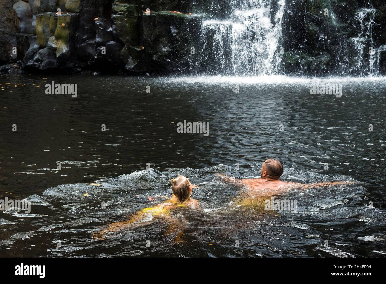 Man swimming in waterfall hi-res stock photography and images - Alamy