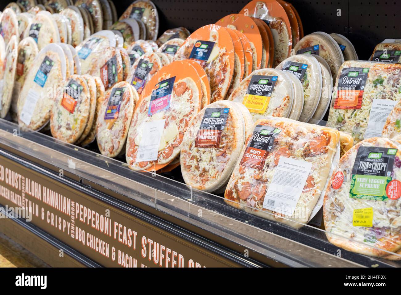 Variety of ready made Pizza on display for sale at ASDA supermarket ...