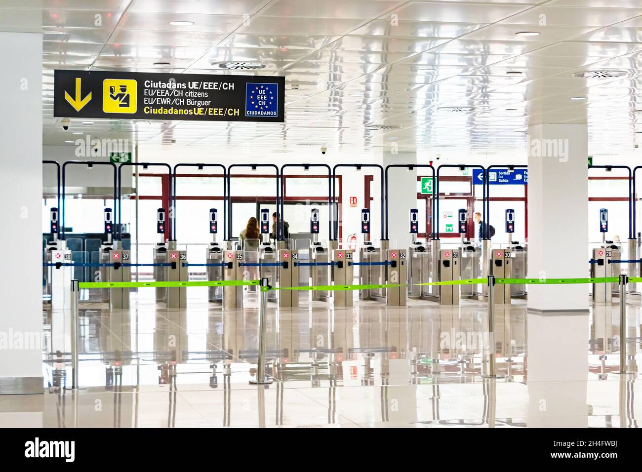 automated security barrier gates at passport control in the terminal at ...