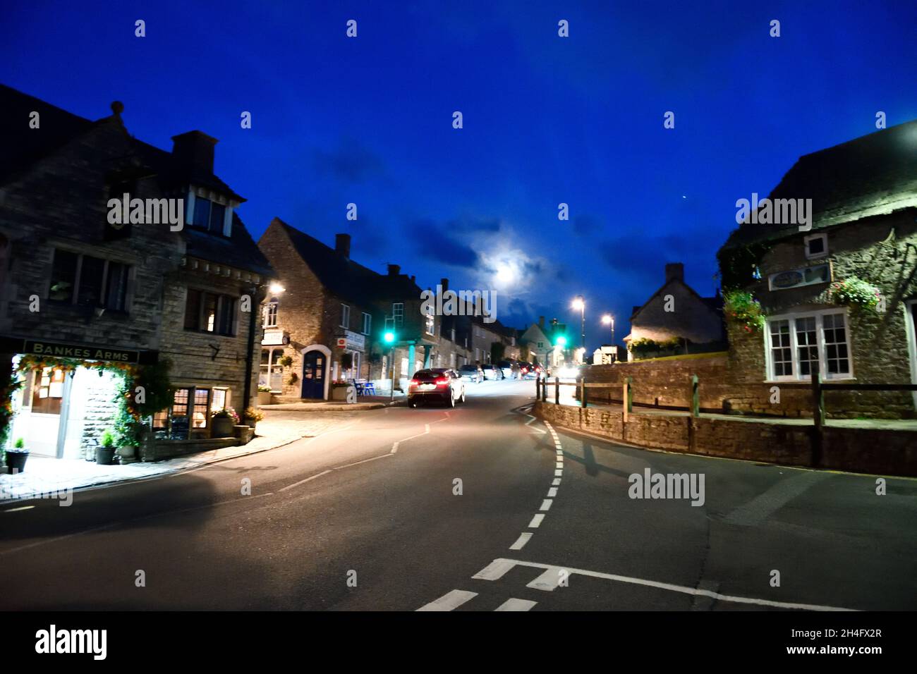 Corfe main Street at Night Dorset England uk Stock Photo - Alamy