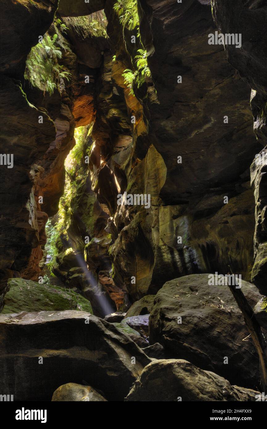 Vertical shot of a cave with rock formations Stock Photo - Alamy
