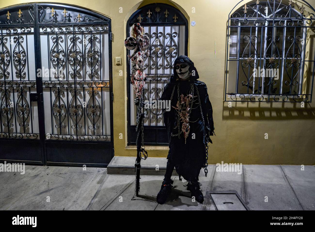 Tonacatepeque, El Salvador. 01st Nov, 2021. A reveller poses for a ...