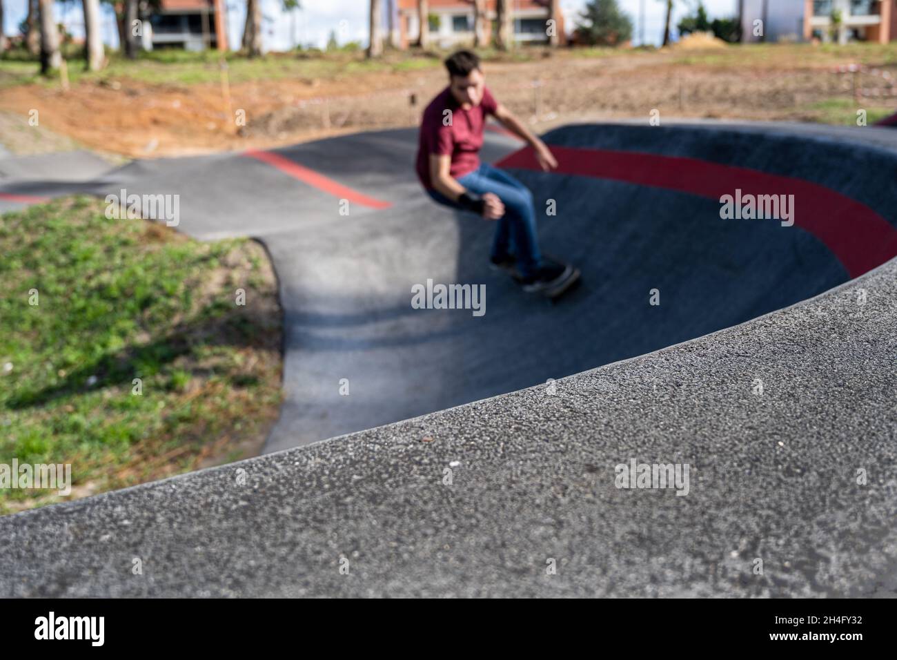 Skateboarder on pump track park hi-res stock photography and images - Alamy