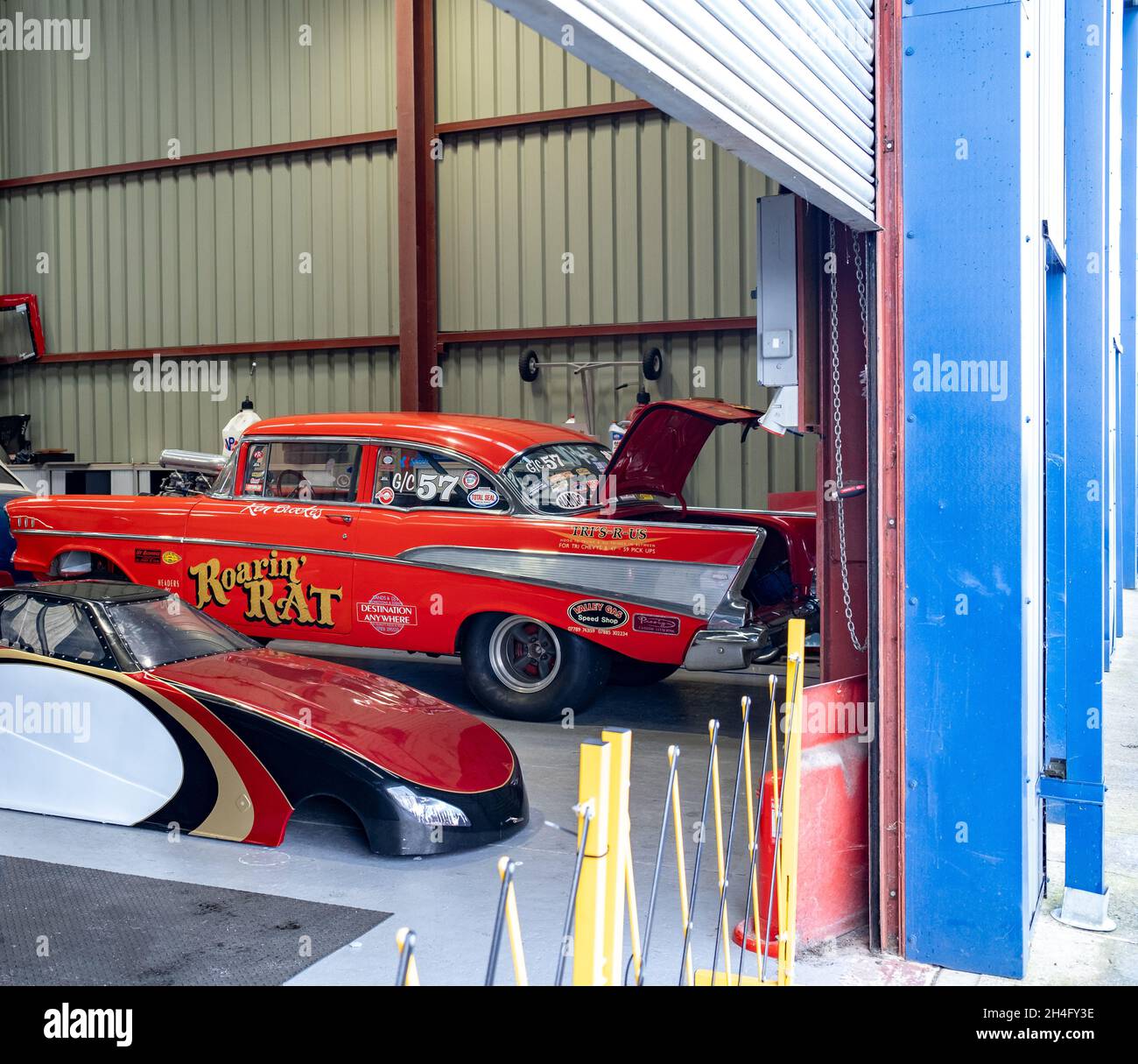 Roarin’ Rat drag racing car in the garage for working on before running ...