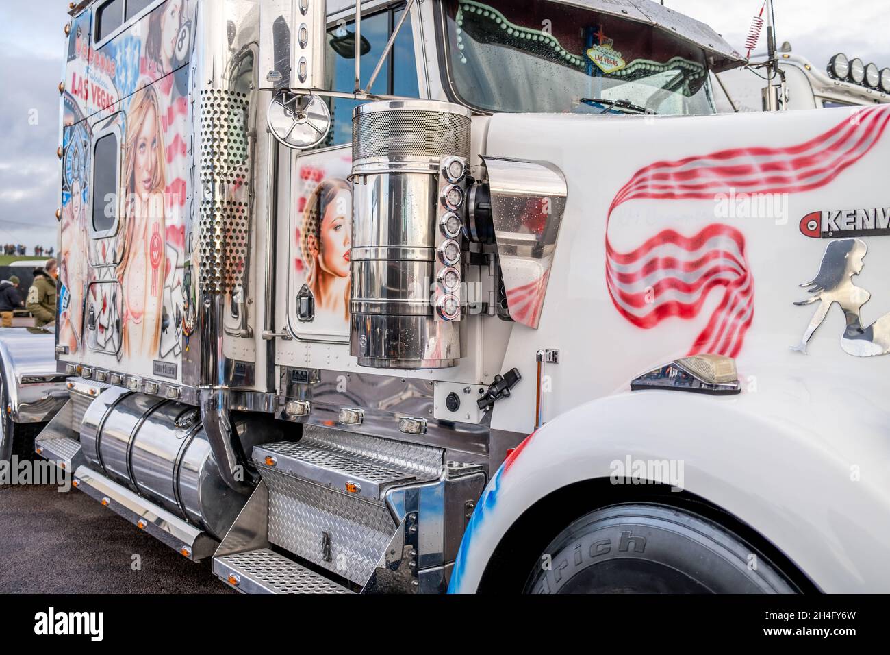 Side on view of a big rig lorry with a custom paint job used to ...