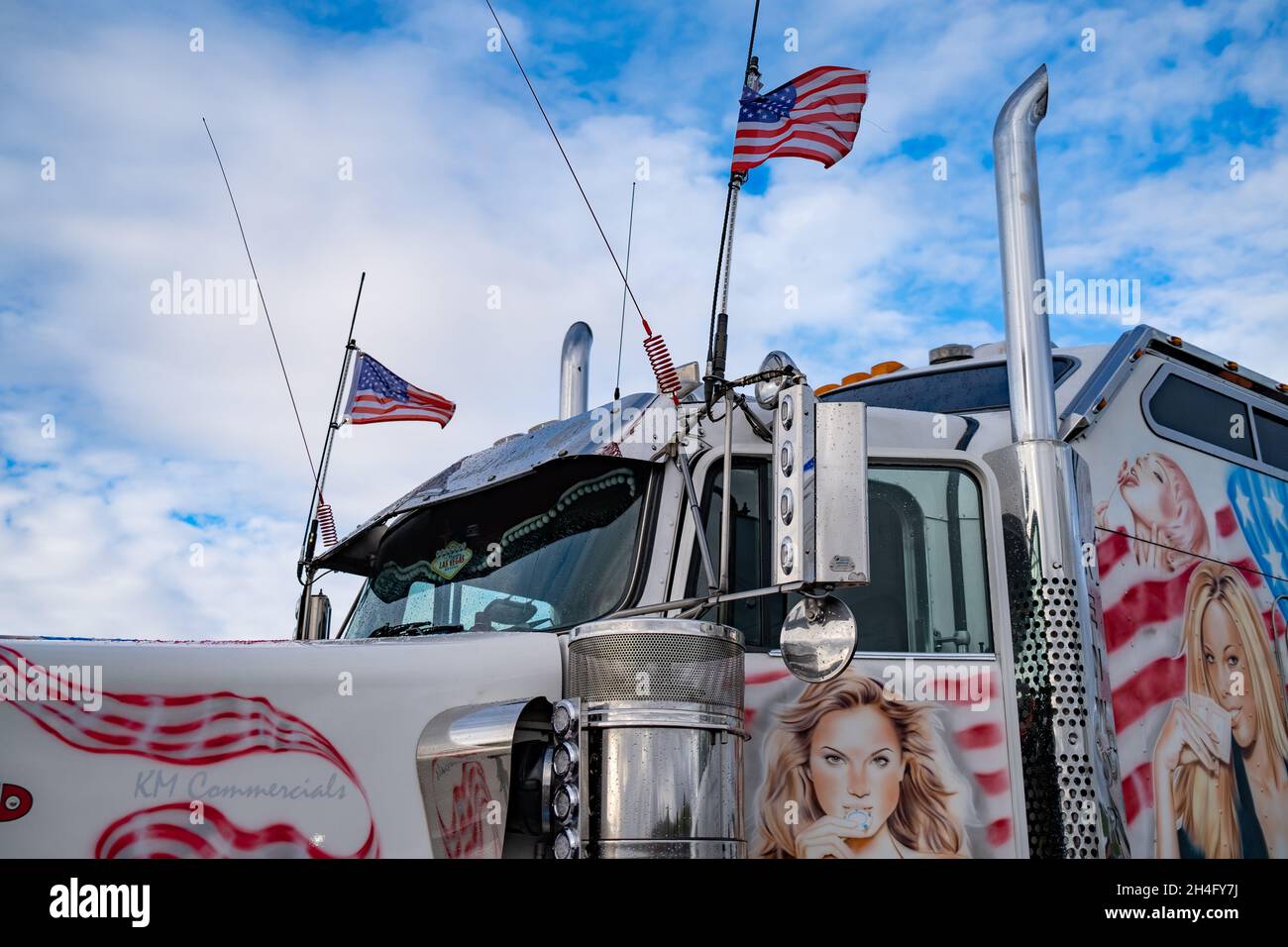 Side on view of a big rig lorry with a custom paint job used to ...