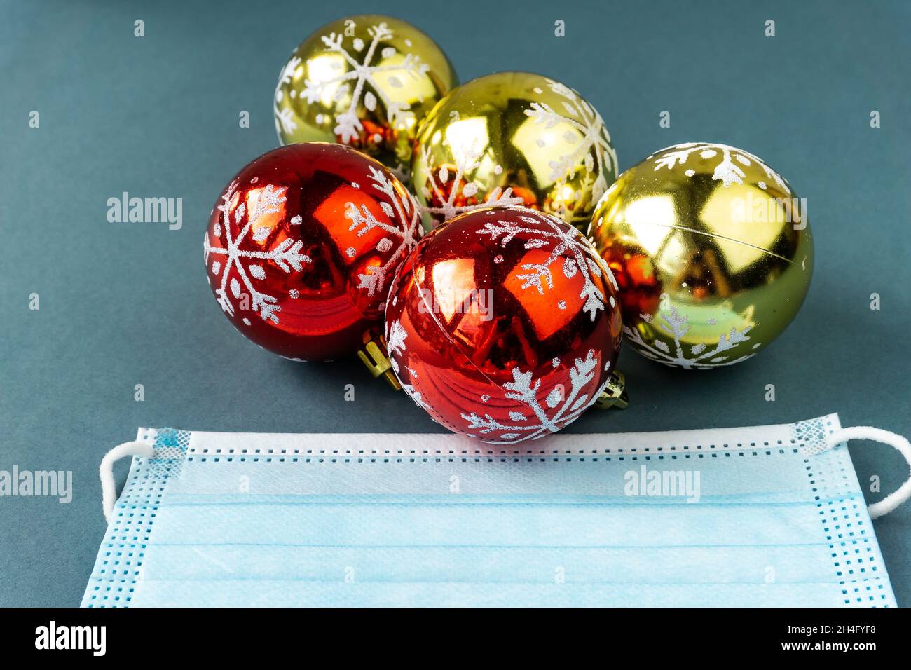 Christmas decoration with medical mask on white background. 2020 ...