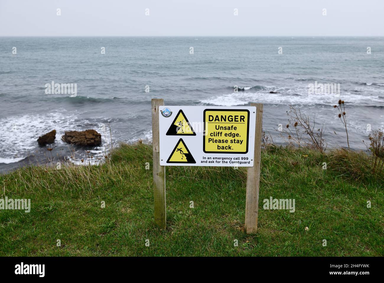 Warning Sign at Peveril point Swanage Dorset England uk Stock Photo - Alamy