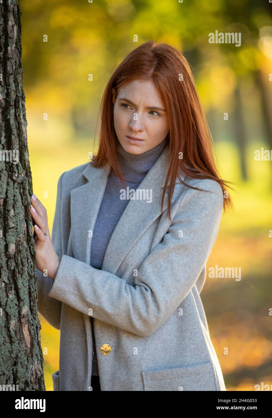Redhead girl autumn leaves hi-res stock photography and images - Alamy
