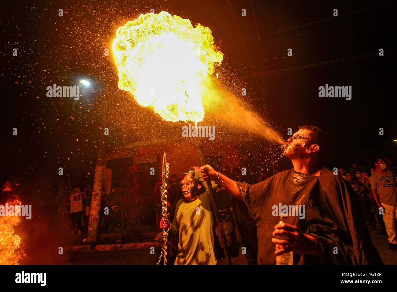 Tonacatepeque, El Salvador. 01st Nov, 2021. A reveller performs with ...