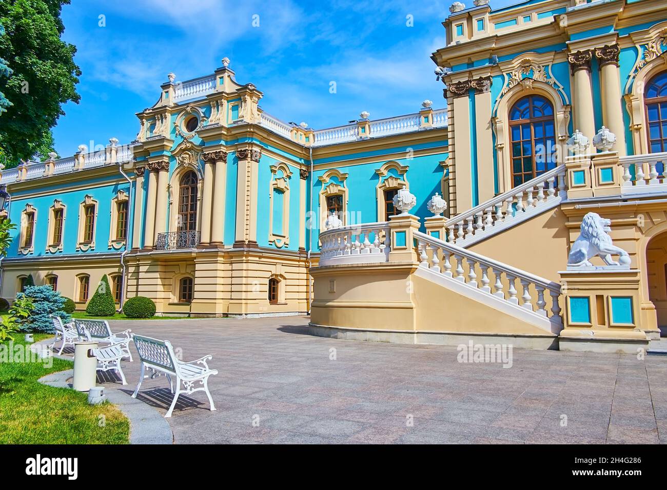 The Baroque exterior of Mariinskyi Palace with wall columns, vases ...