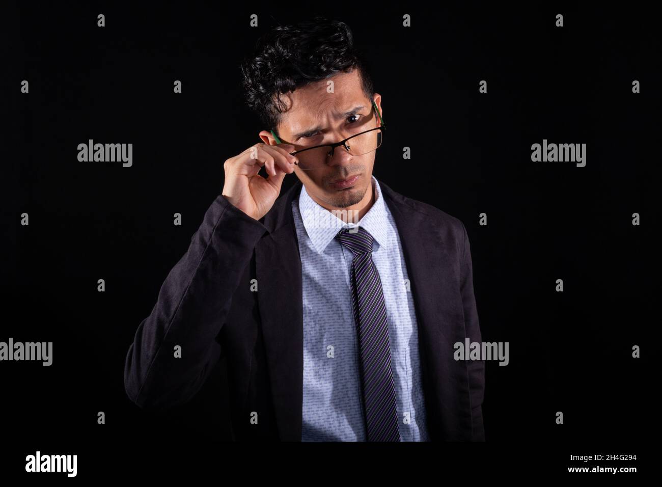 Suspicious looking person hi-res stock photography and images - Alamy