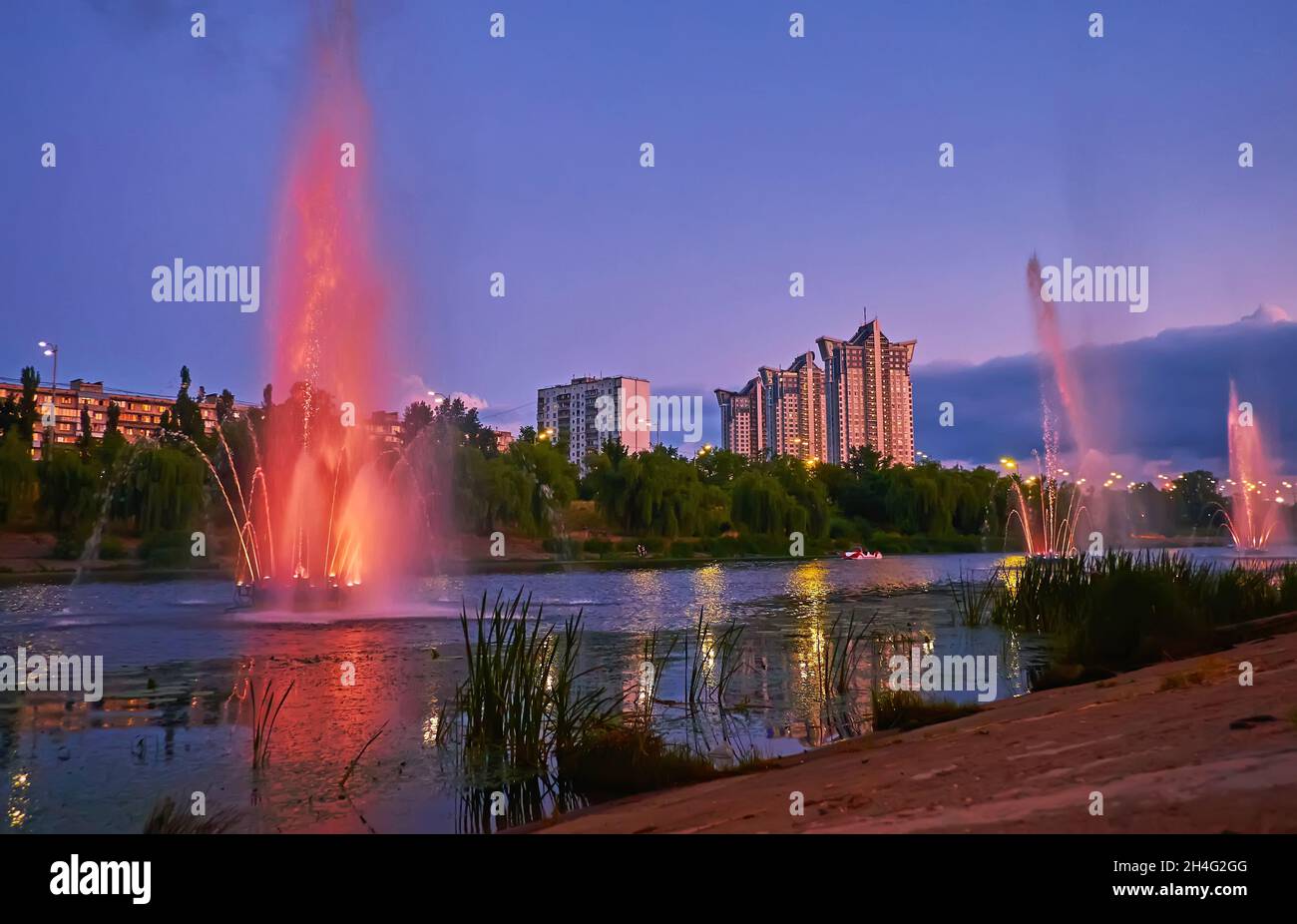 The picturesdue colorful fountains show on the evening Rusanivsky Canal ...