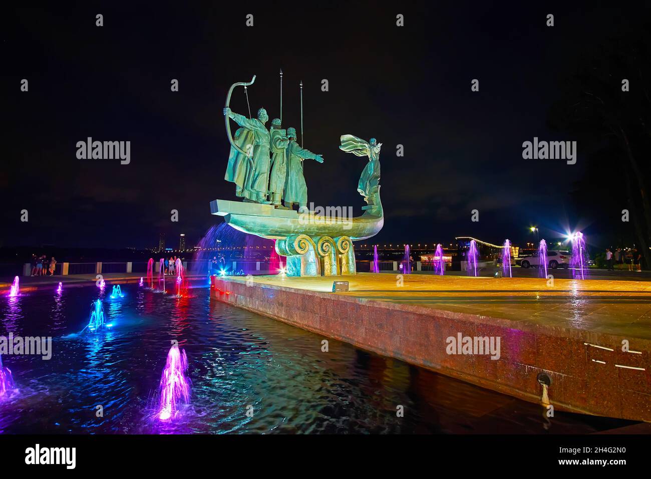 The bright evening illumination and the lighting fountains around City ...