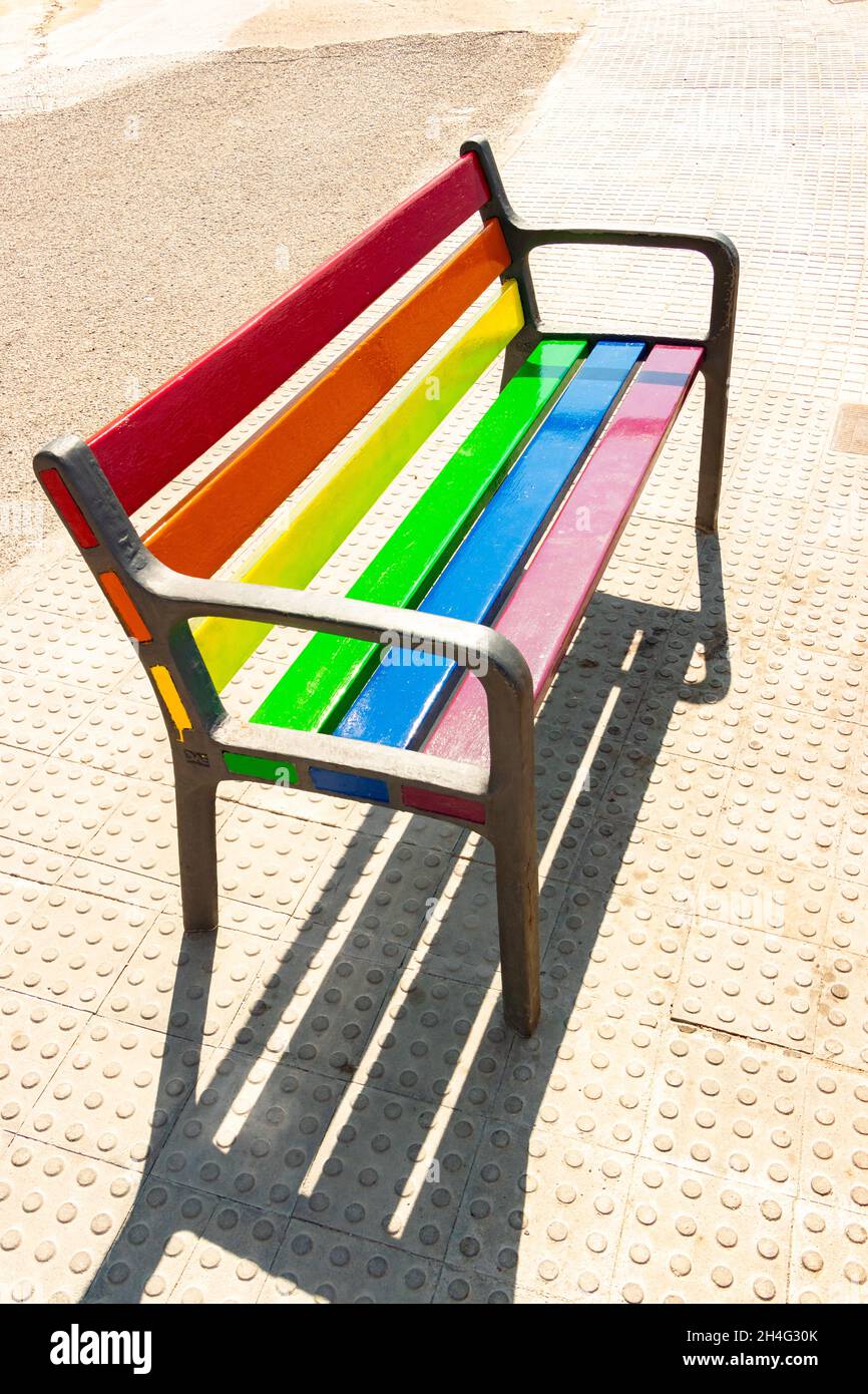 Pride bench seat painted in rainbow flag LGBTQ+ colours in Sant Elm ...