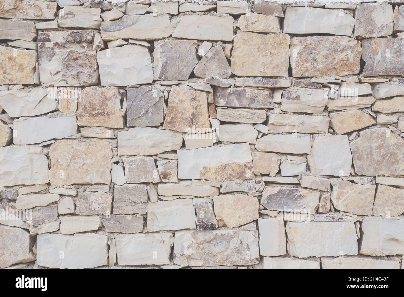 Antique masonry in beige shades. Beautiful textured background from ...