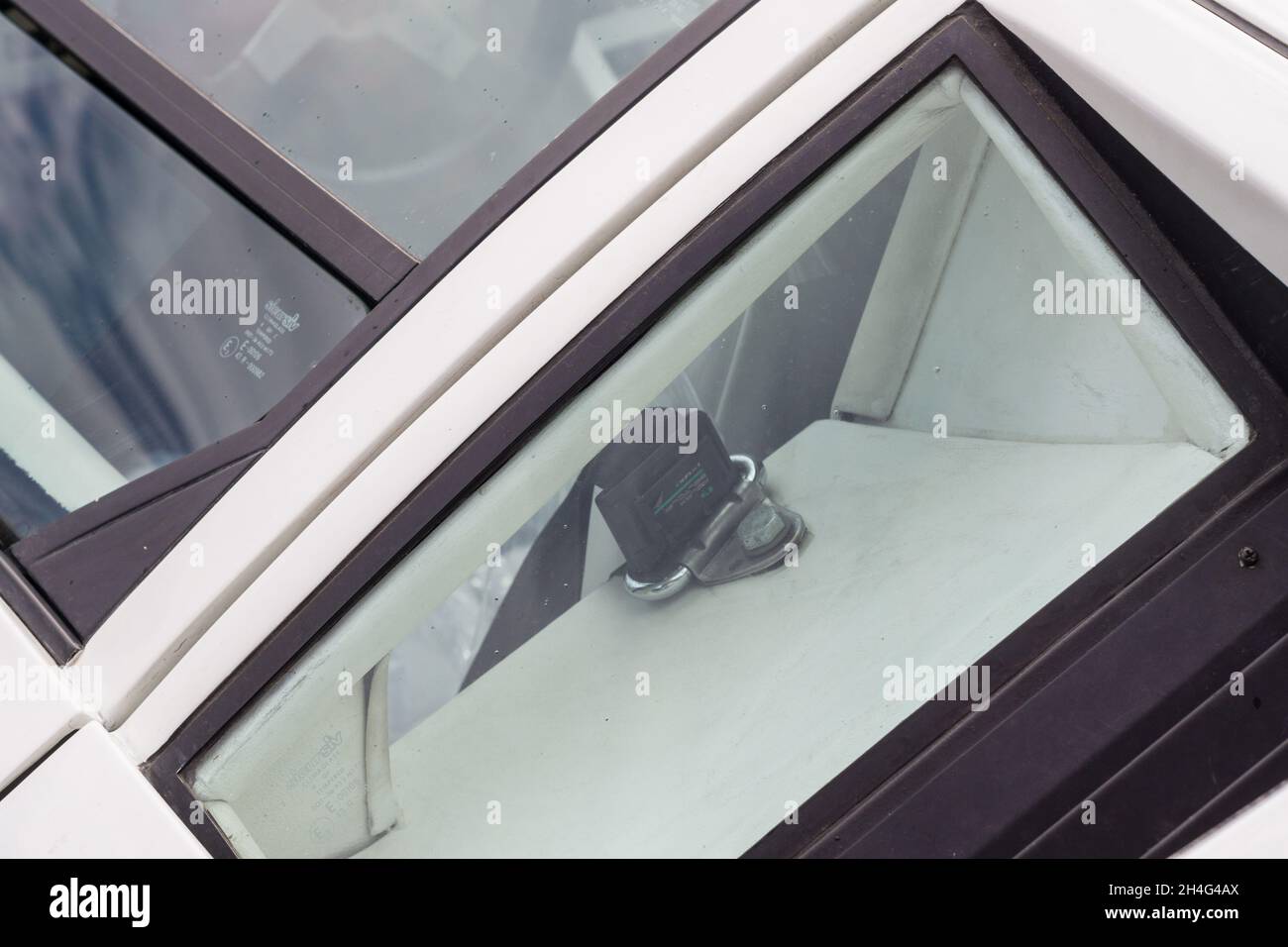 Close up detail of the rear quarter light window on a white Lamborghini ...