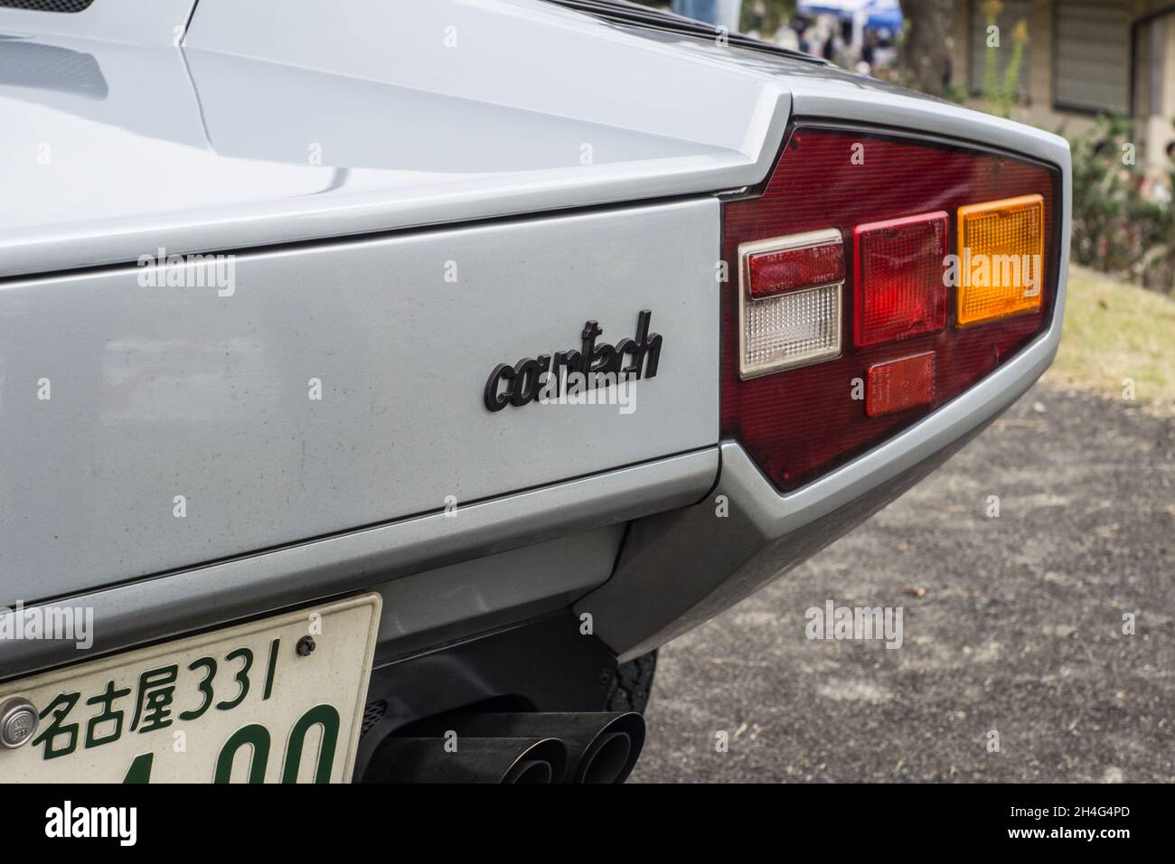 Close up detail of the rear light cluster on a silver Lamborghini ...
