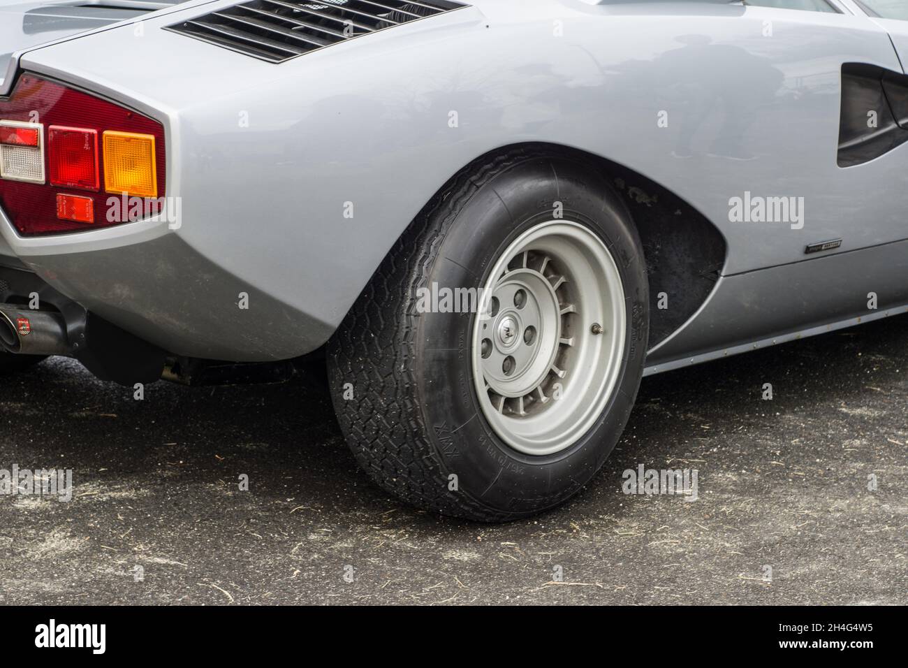 Close up detail of the Campagnolo alloy wheel and arch on a silver ...