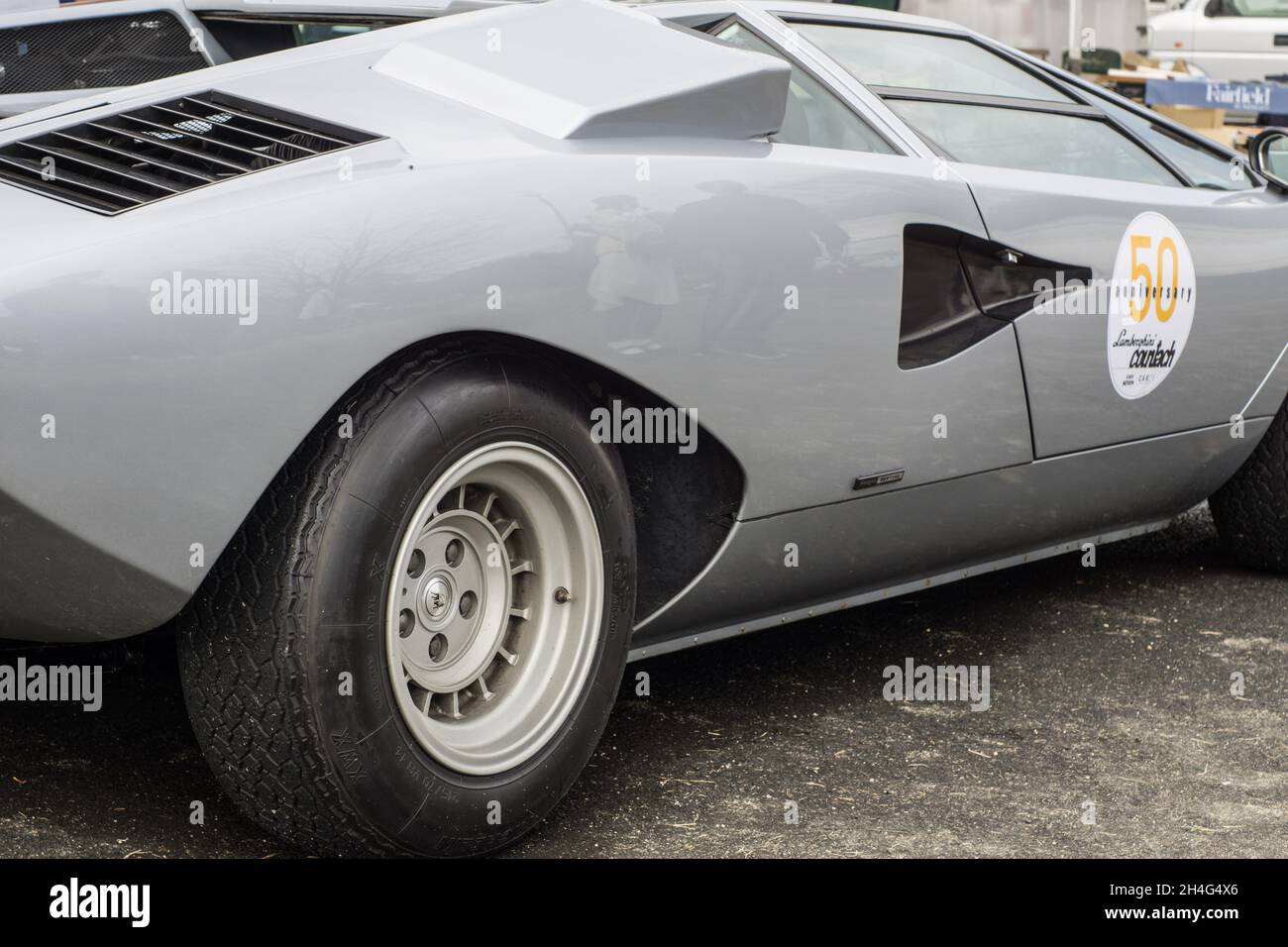 Close up detail of the Campagnolo alloy wheel and arch on a silver ...