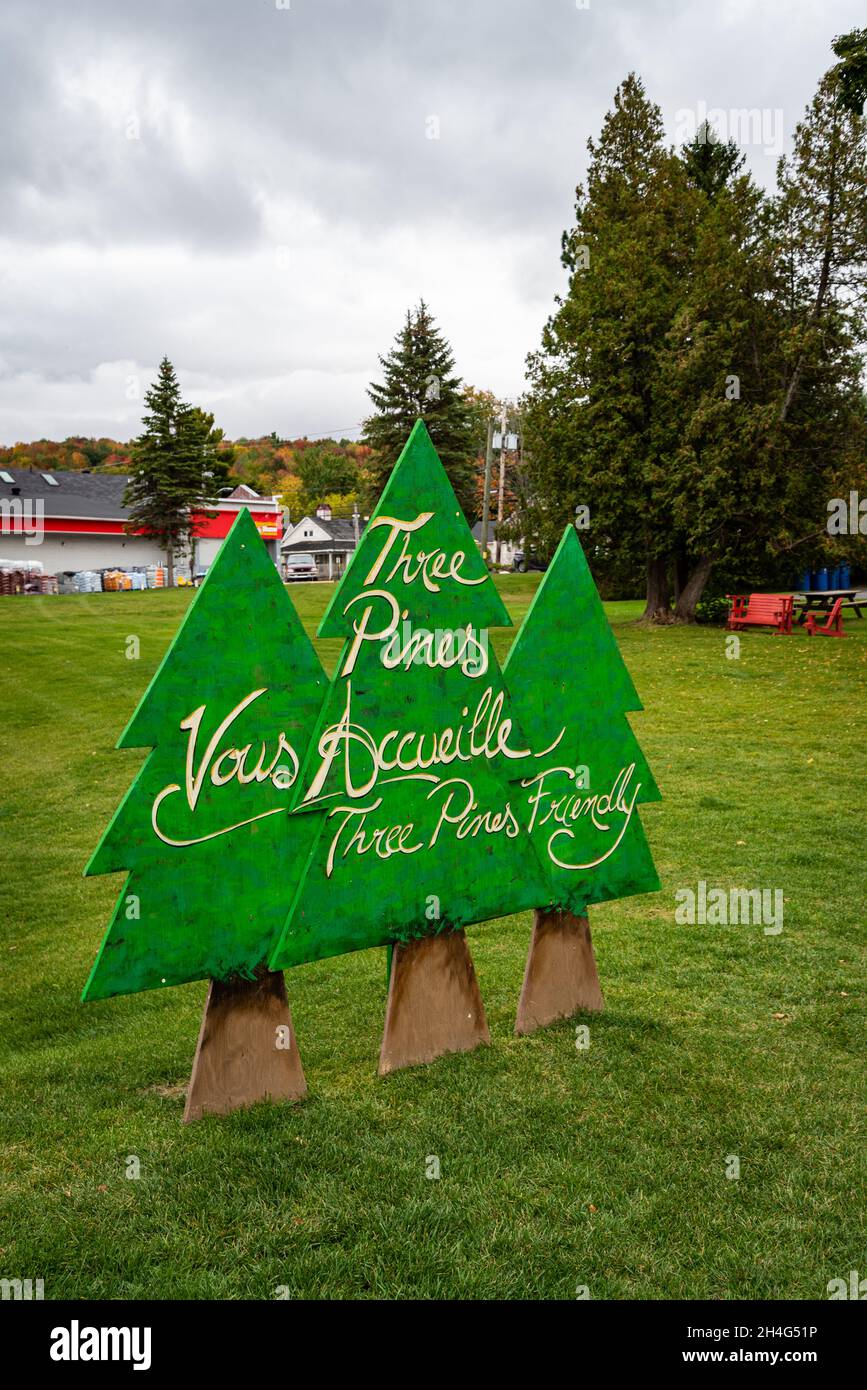 Photo of three pines sign at the village park green. The village is the ...
