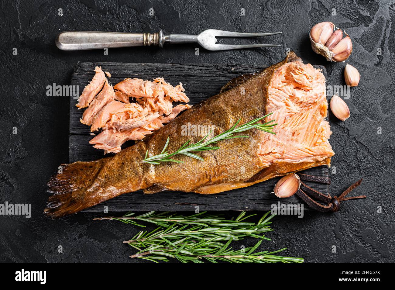 Salmon Hot smoked, trout fish meat. Black background. Top view Stock ...