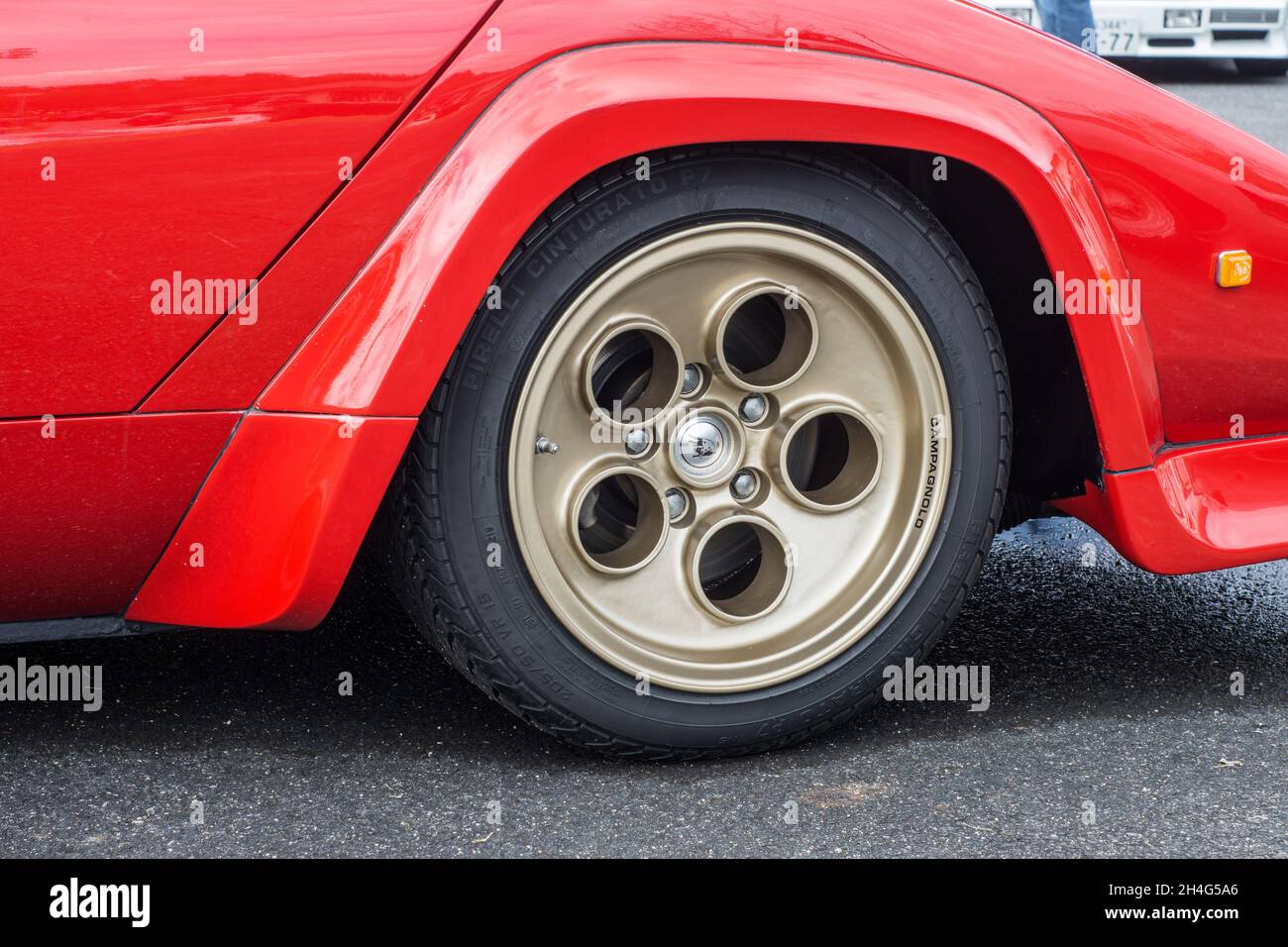 Close up detail of a gold Campagnolo Bravo wheel on a red Lamborghini ...