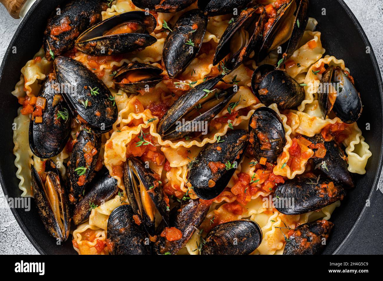 Traditional italian seafood pasta with mussels, Spaghetti and tomato ...