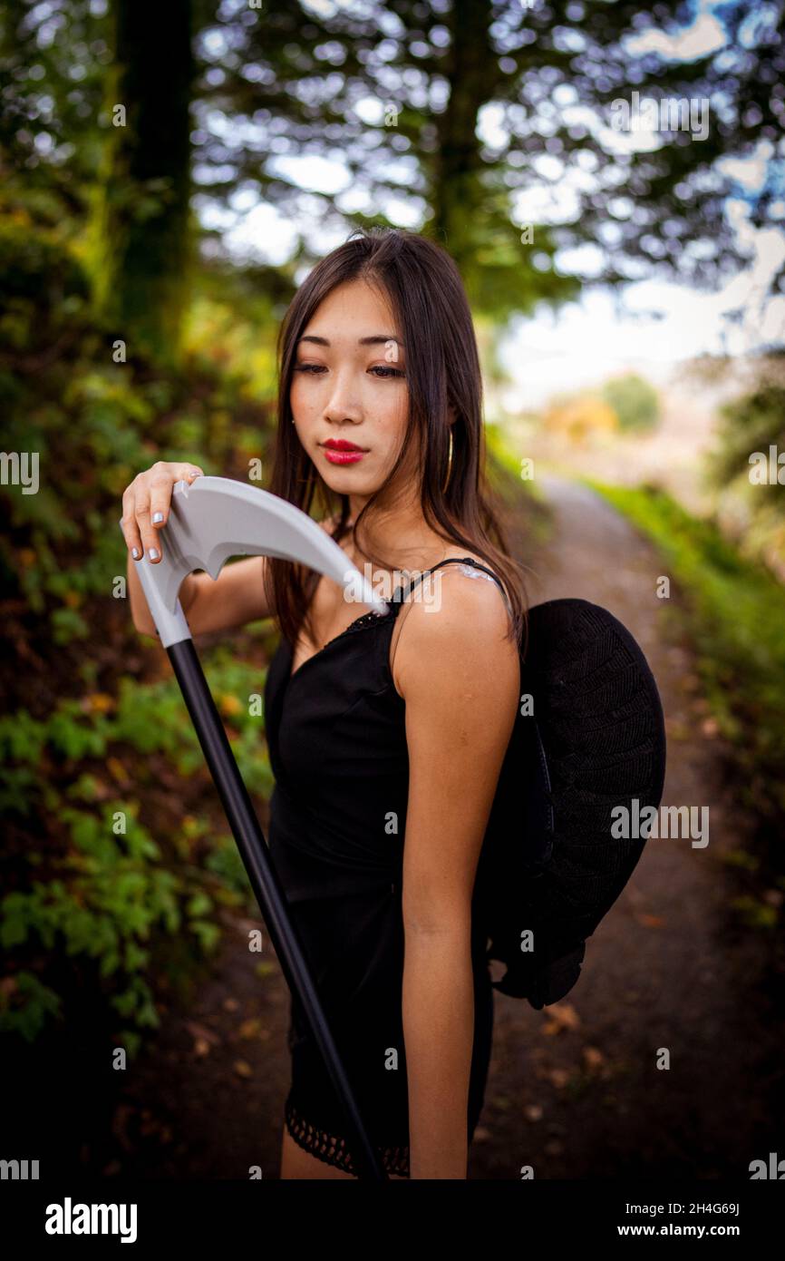 Grim Reaper Holding Woman Wallpaper