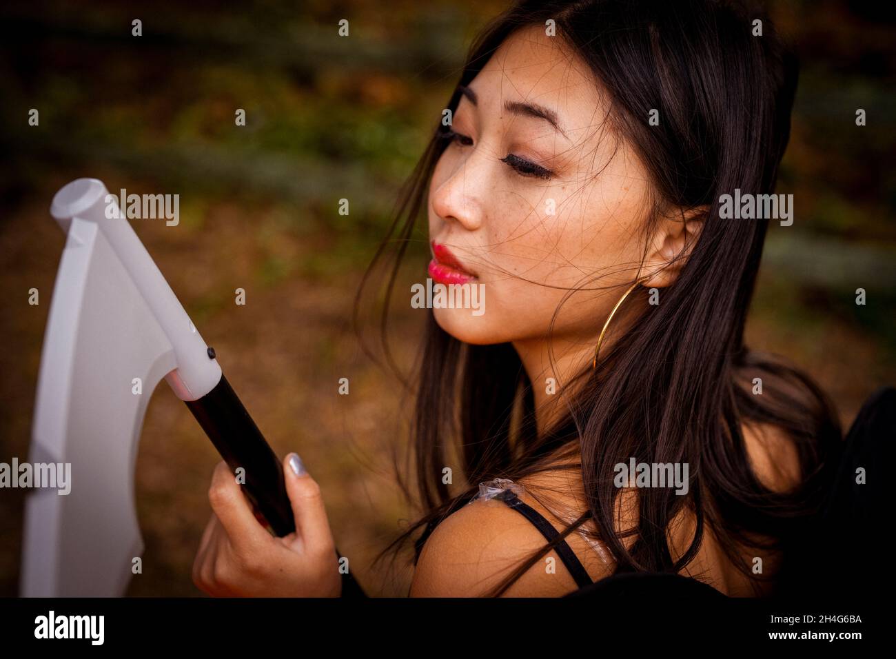 Young Woman Wearing a Grim Reaper Cosplay Outfit in the Woods Stock ...